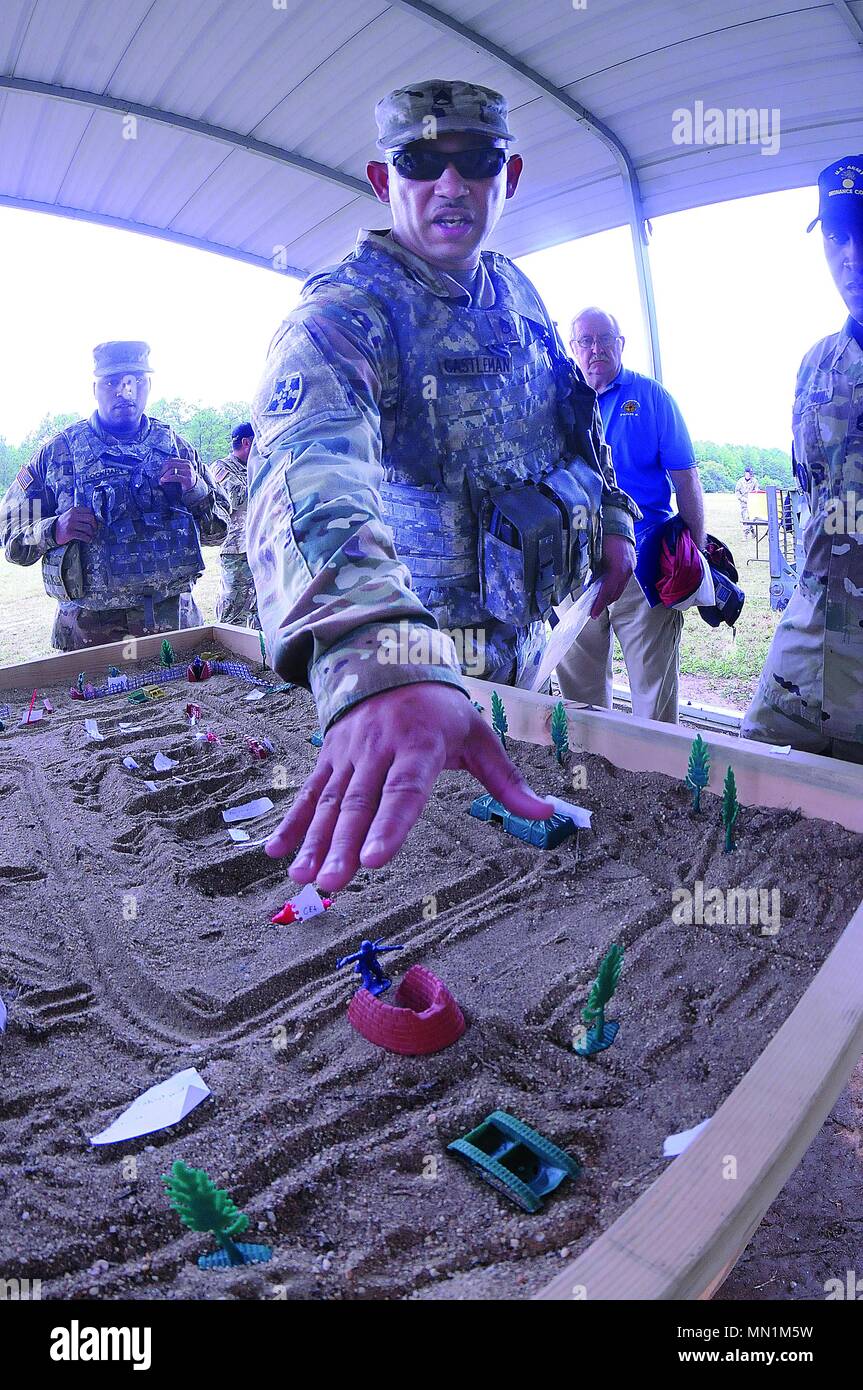 Staff Sgt. Stephen Castleman, 4th Infantry Division team member, briefs ...