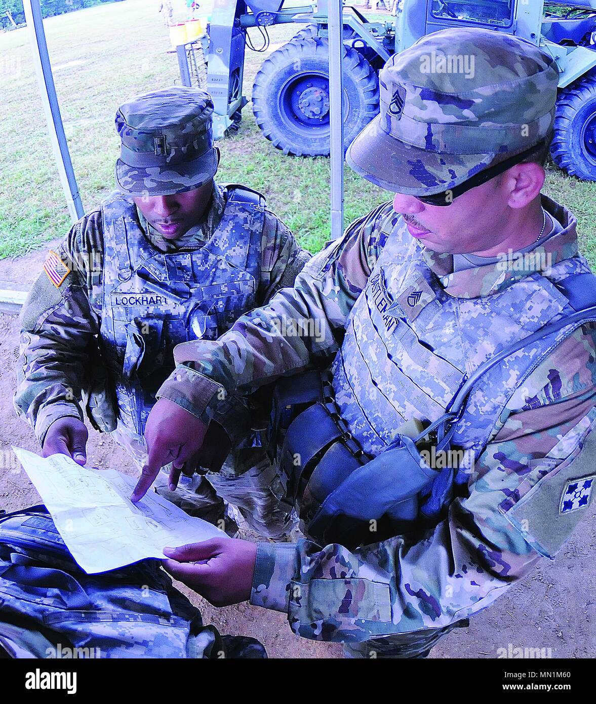 Warrant Officer 1 Marlon Lockhart and Staff Sgt. Stephen Castleman ...