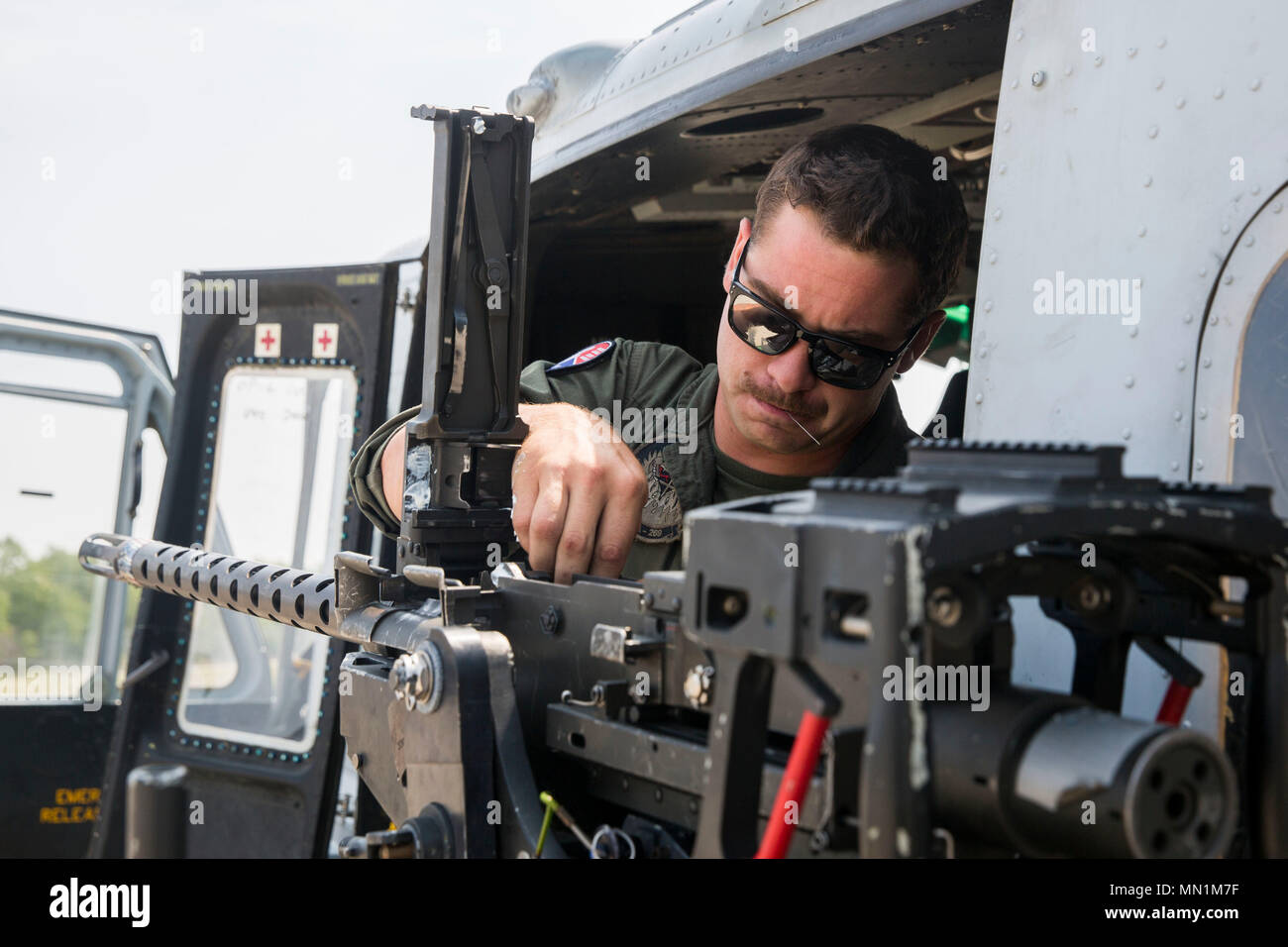 U.S. Marine Corps Cpl. Matthew T. Glora, a UH-1Y Huey crew chief with ...