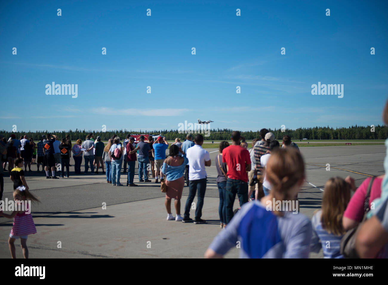 People from across the Fairbanks North Star Borough gather to watch an ...