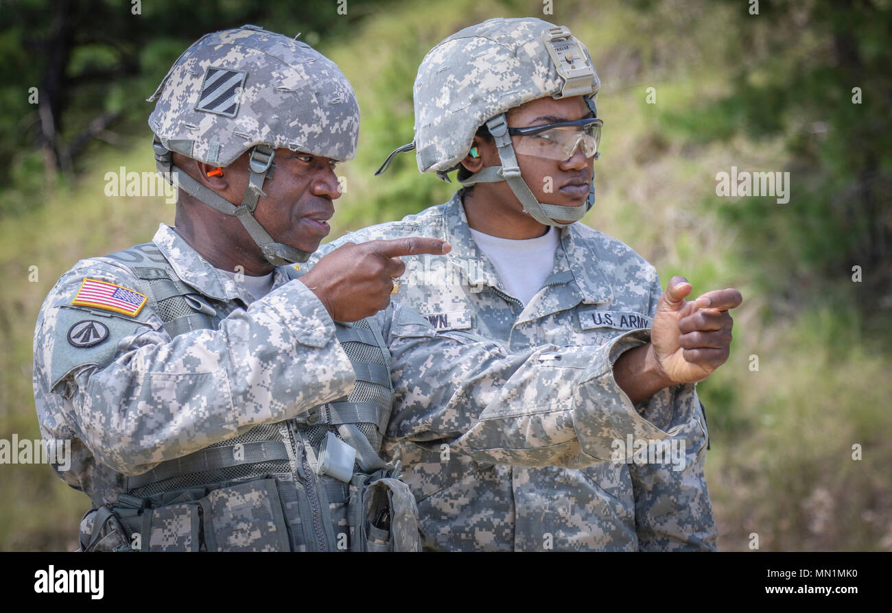 Command Sgt. Maj. Ronnie Farmer (left), command sergeant major, 335th ...