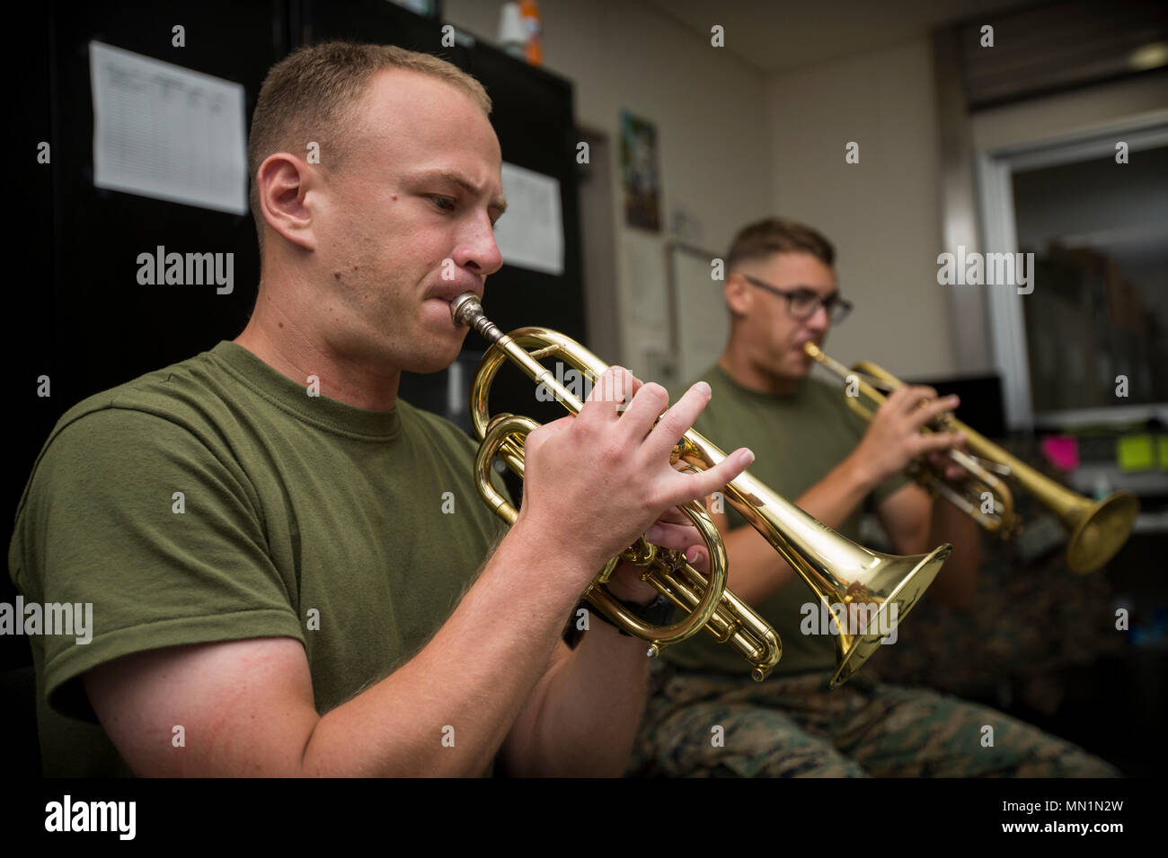 U.S. Marine Corps Cpl. Mathew Kitzen-Ableson, a trumpeter with the III ...