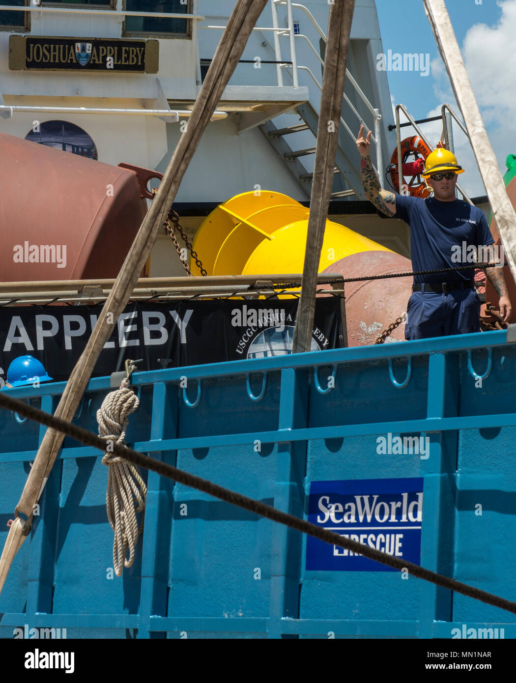 Petty Officer 2nd Class Kellen Zanandrie, crewmember aboard the Coast ...