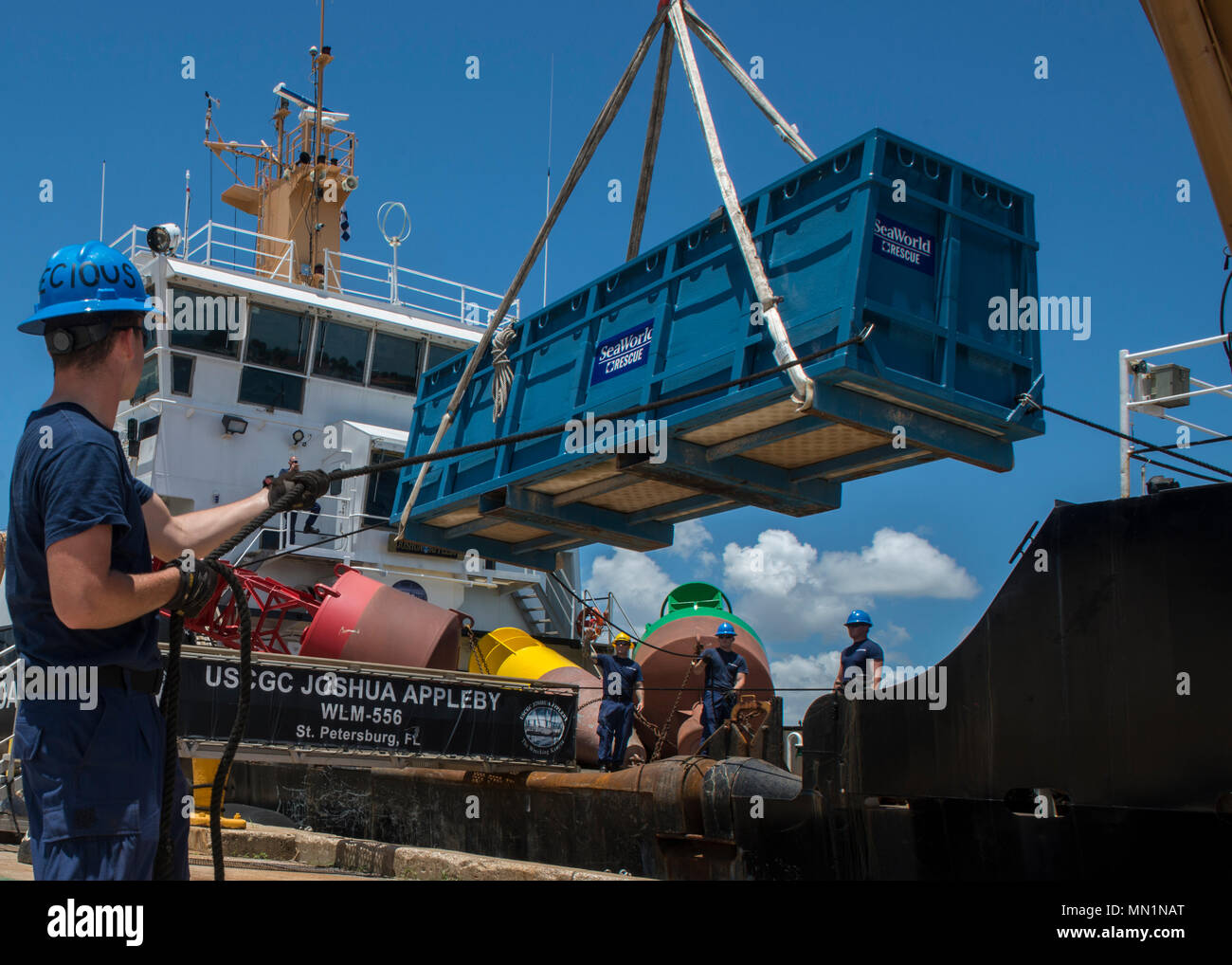 Seaman Ryan Mcmahon, crewmember of the Coast Guard Cutter Joshua ...