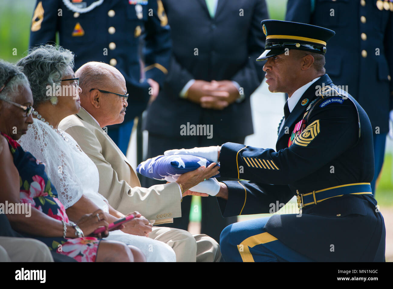 A Soldier from the 3d U.S. Infantry Regiment (The Old Guard) presents ...