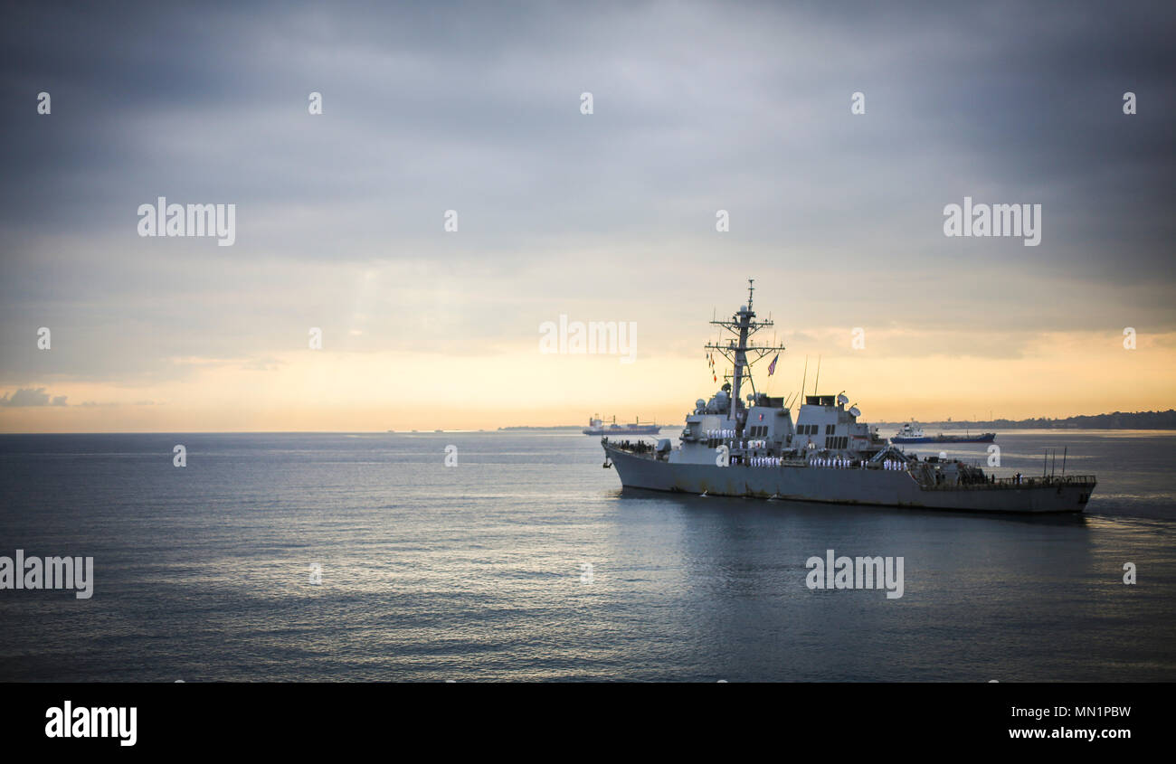 The destroyer USS Barry (DDG 52) sails to the site of the wreckage of ...