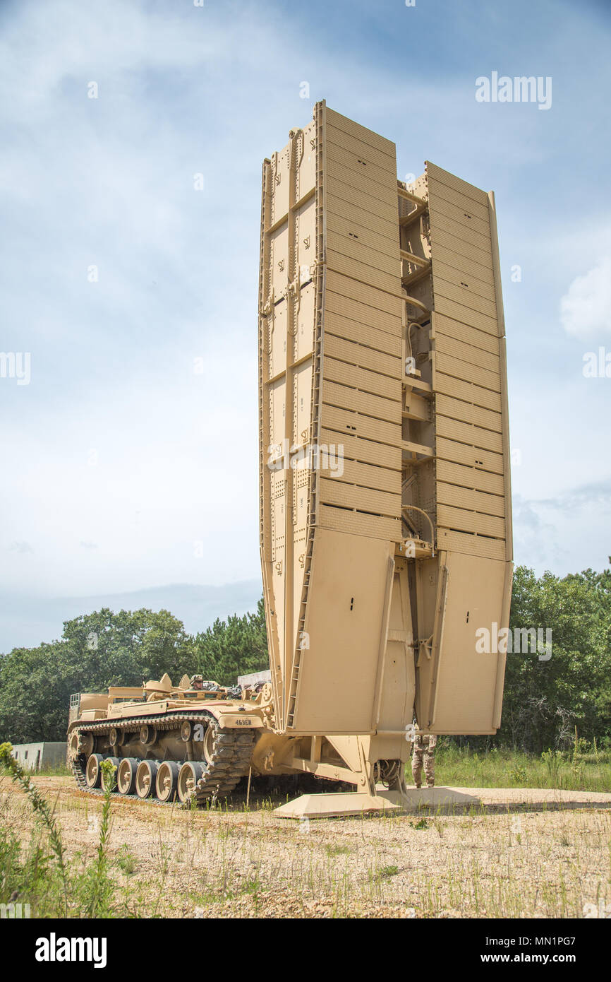 U.S. Army Soldiers of the 396th Engineer Company deploy a 60 foot ...