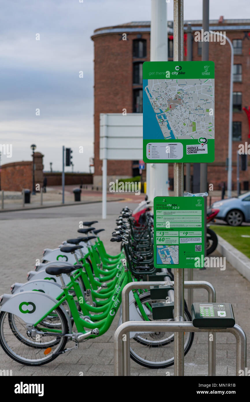 Green & White Electric Bicycles at Albert Dock, Liverpool Stock Photo ...