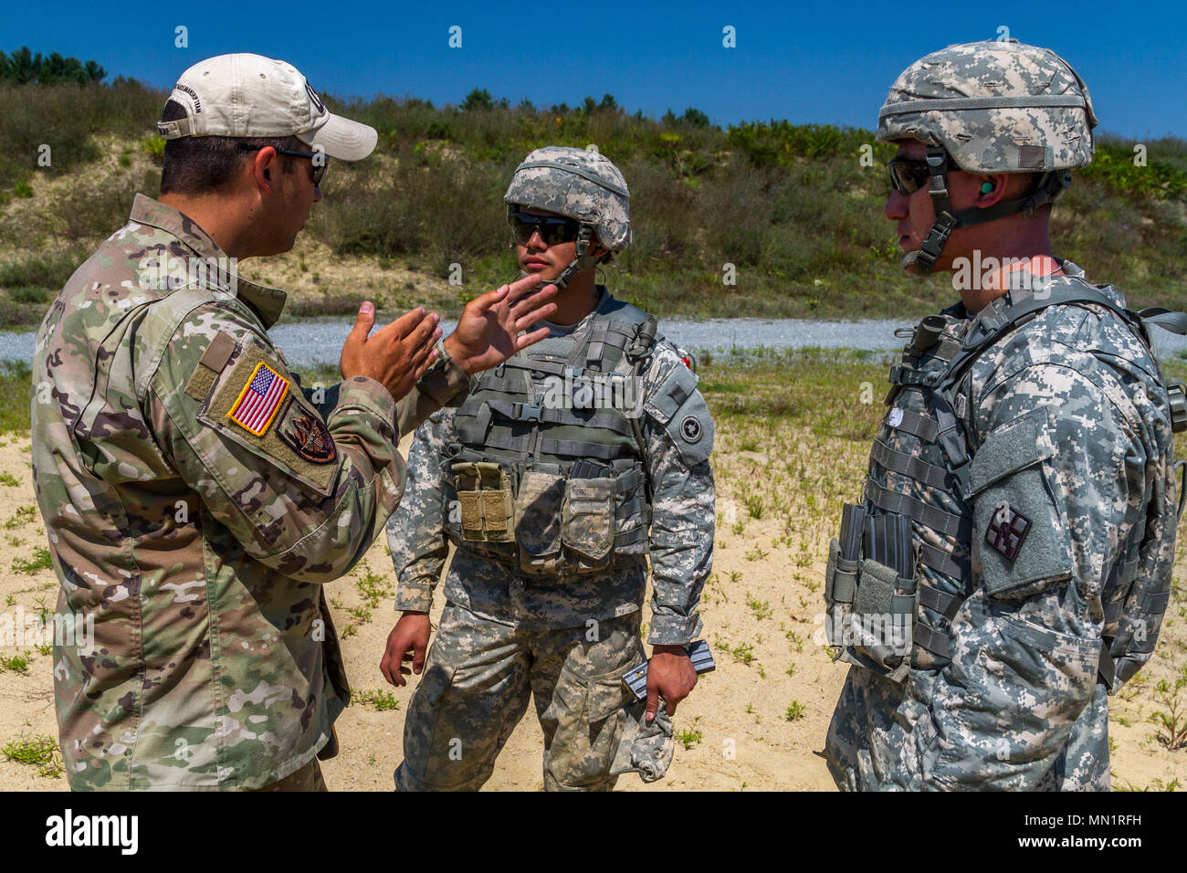 Sgt. Joseph Hall, U.S. Army Reserve Shooting Team, teaches Spc. Kenny ...