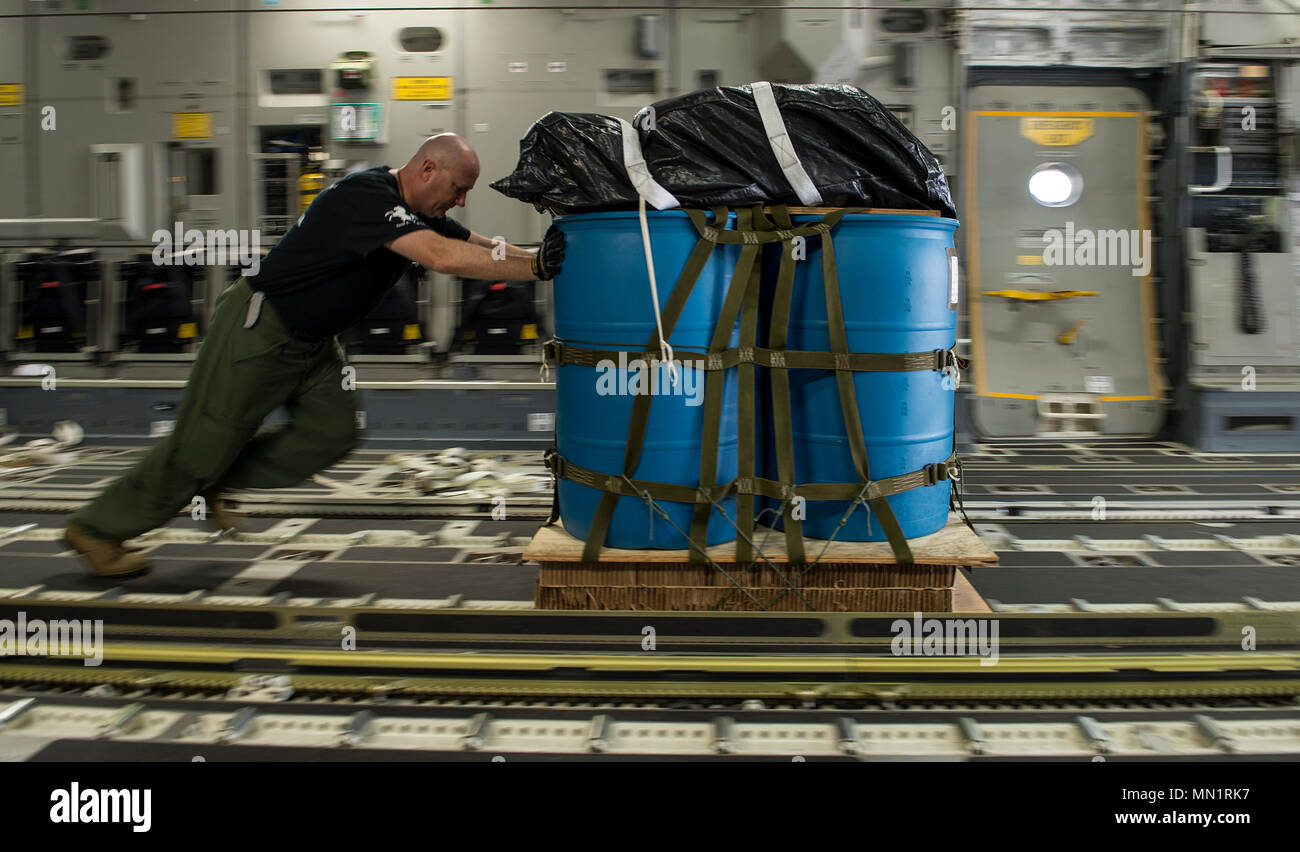 Royal Australian Air Force WOFF David Sheen, loadmaster with the 36th ...