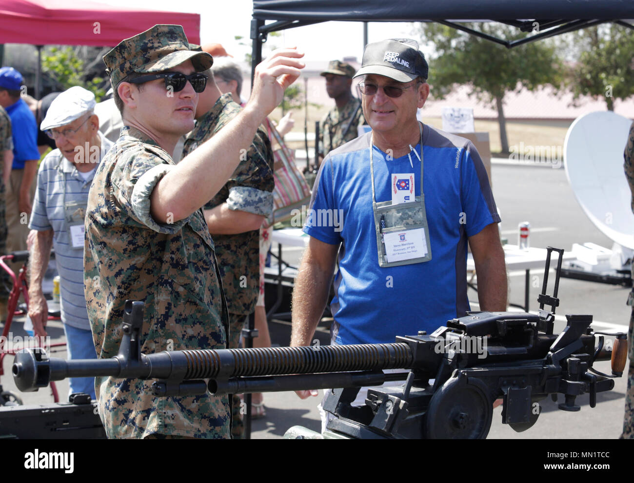 Steve Harrison, a reunion guest, observes a demonstration given at the ...