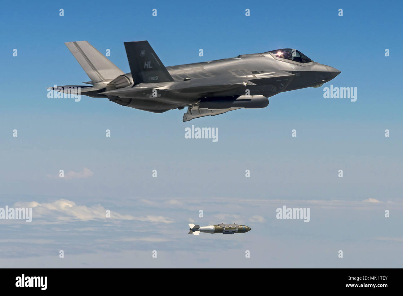 An F-35A Lightning II aircraft from Hill Air Force Base, Utah, drops a 2,000-pound GBU-31 bomb ...