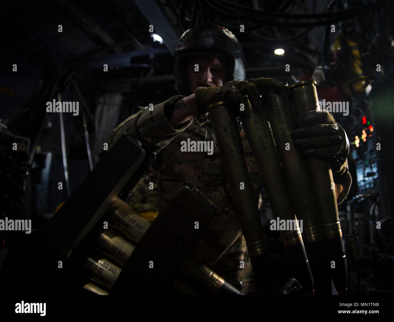 A 4th Special Operations Squadron aircrew conducts a live-fire training ...