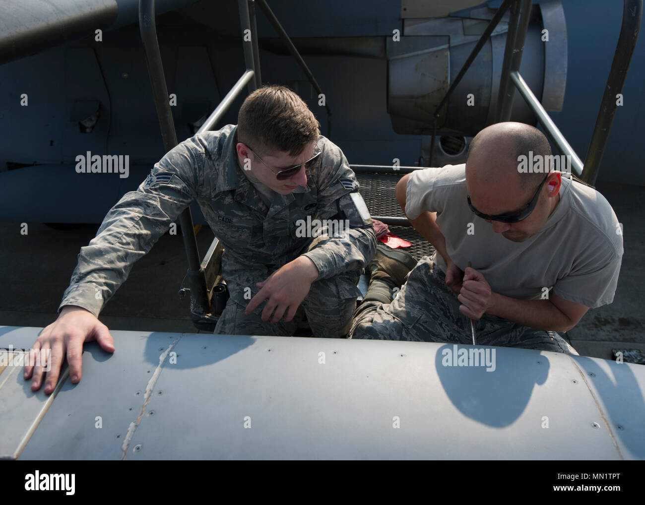 Tech. Sgt. Jeremy Monsivais (right) and Senior Airman Dylan Cade (left ...