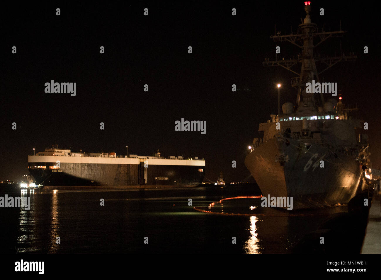 U.S. maritime vessel Green Ridge, left, arrives to load four MV-22B ...