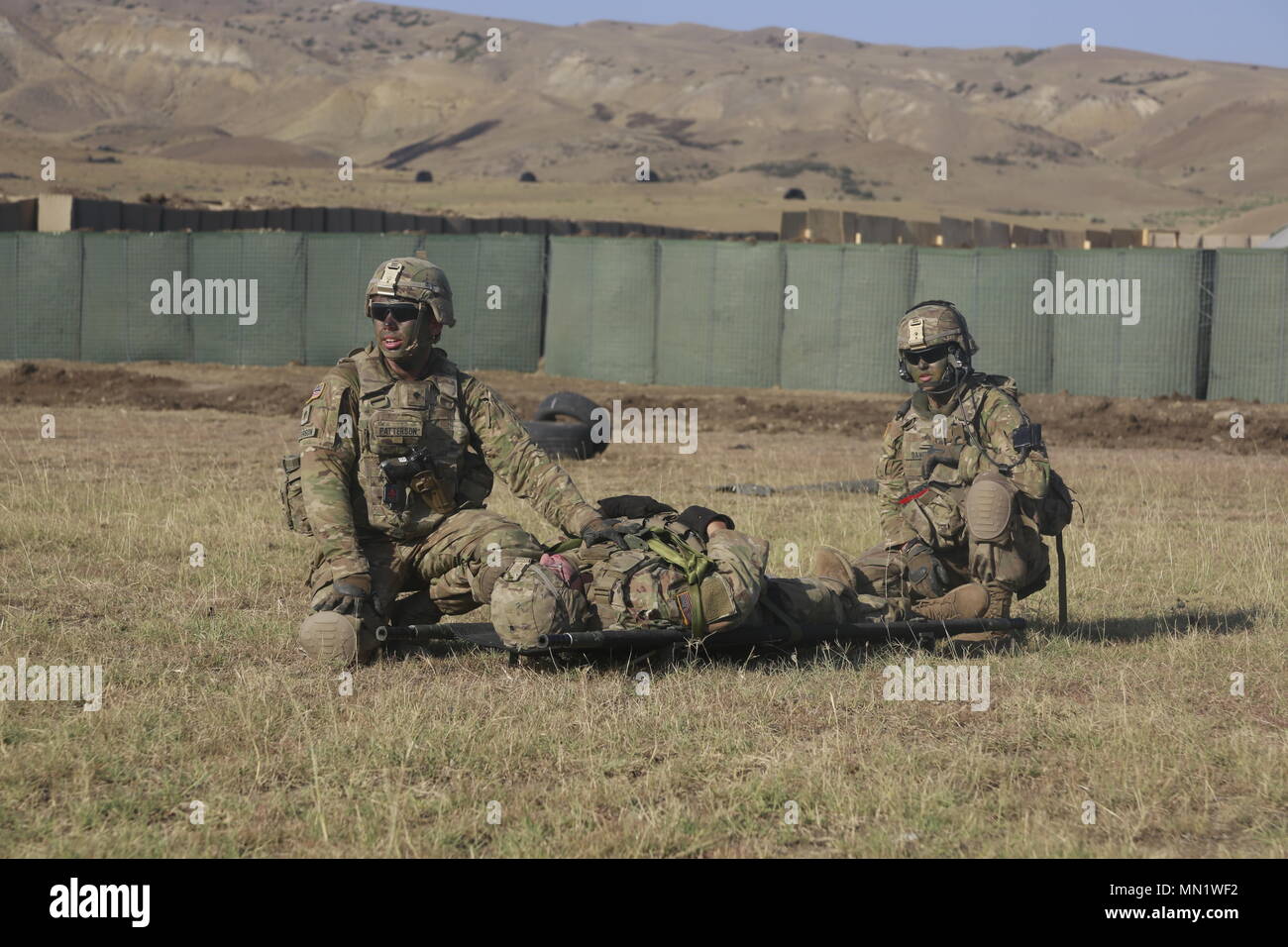 U.S. Soldiers, Sgt. Staci Daniel (right) and Spc. Timothy Patterson ...