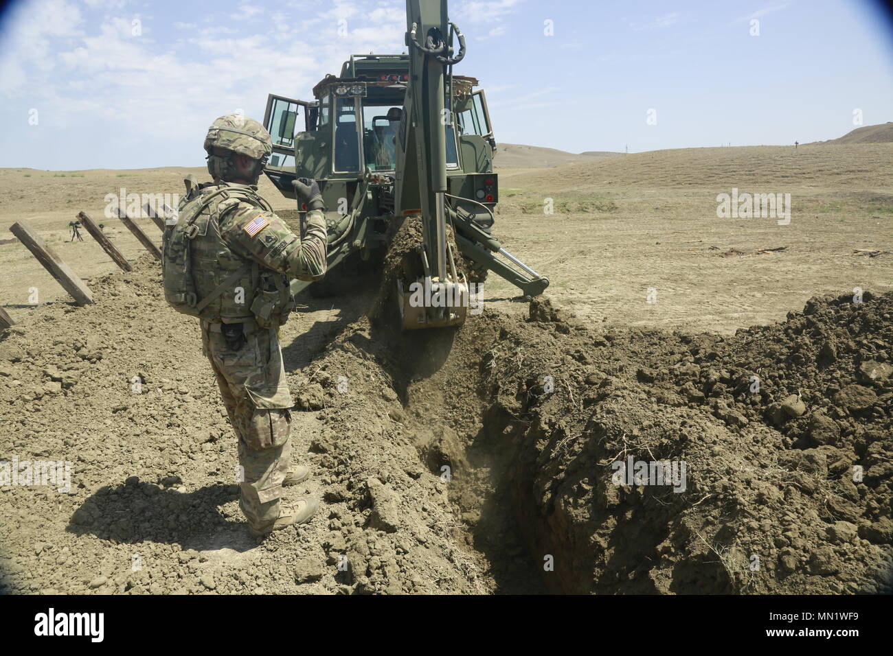 U.S. Army Staff. Sgt. Scott Lofgren assigned to 500th Engineer Support ...