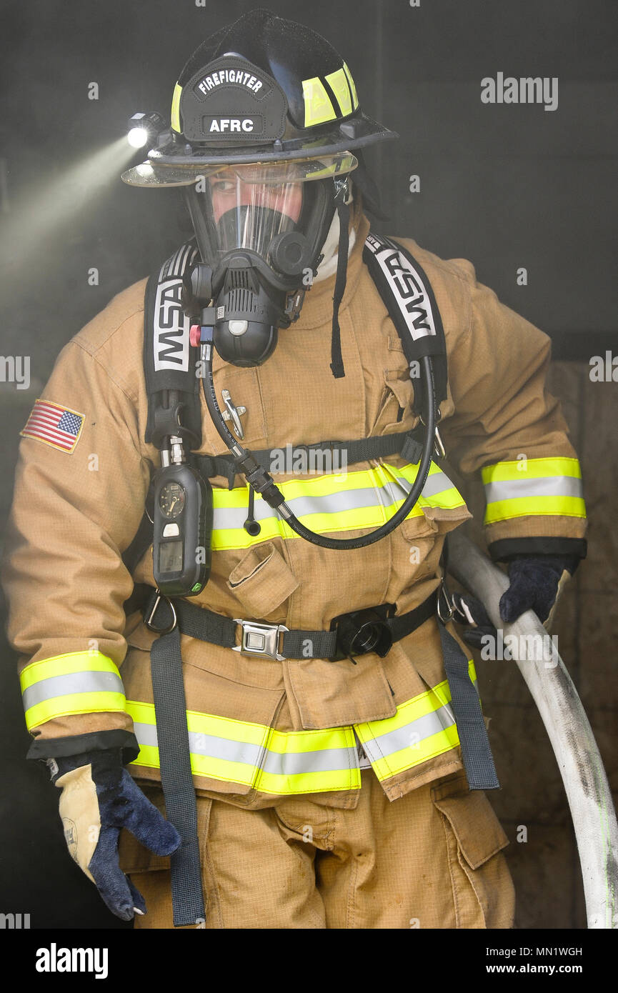 An Air Force Reserve firefighter participates in structure fire ...