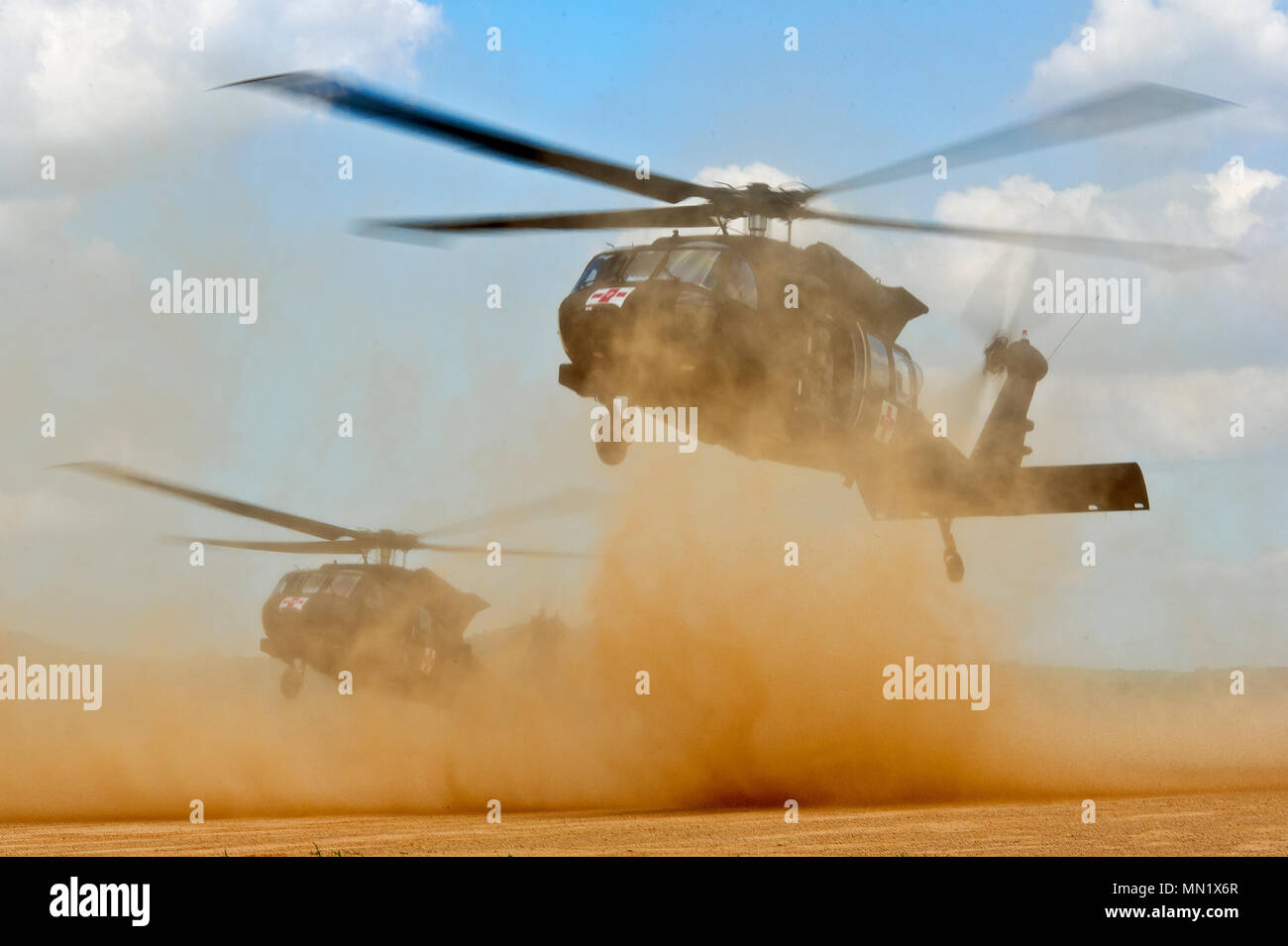 Two U.S. Army HH-60M MEDEVAC helicopters assigned to Charlie Company ...
