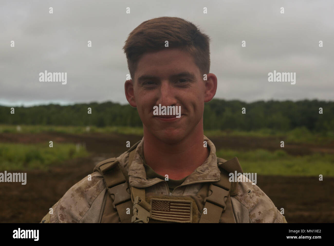 Lance Cpl. Logan C. Baughman pauses during training on the live-fire ...