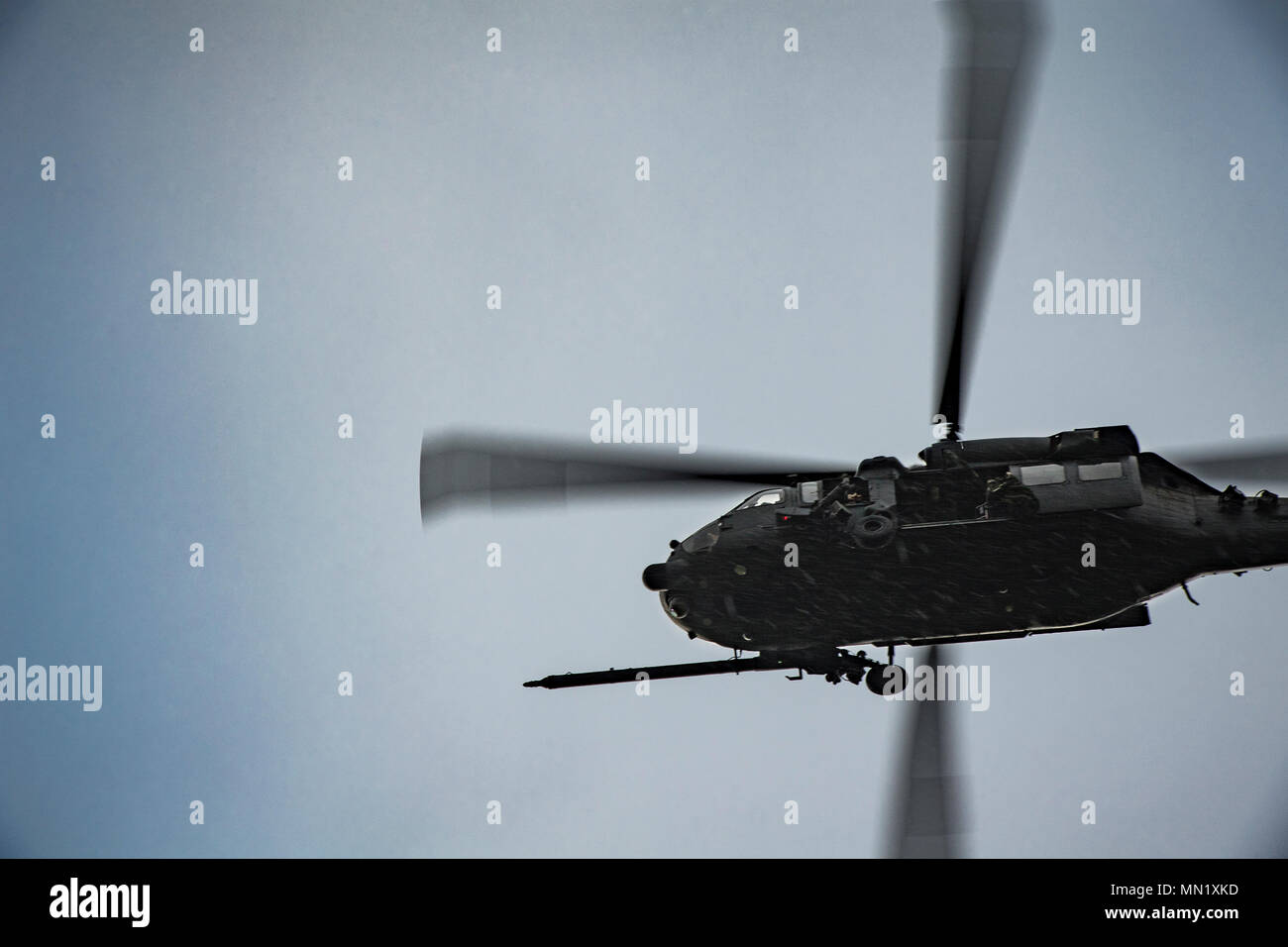 Airmen from the 38th and 41st Rescue Squadrons fly in an HH-60G Pave ...