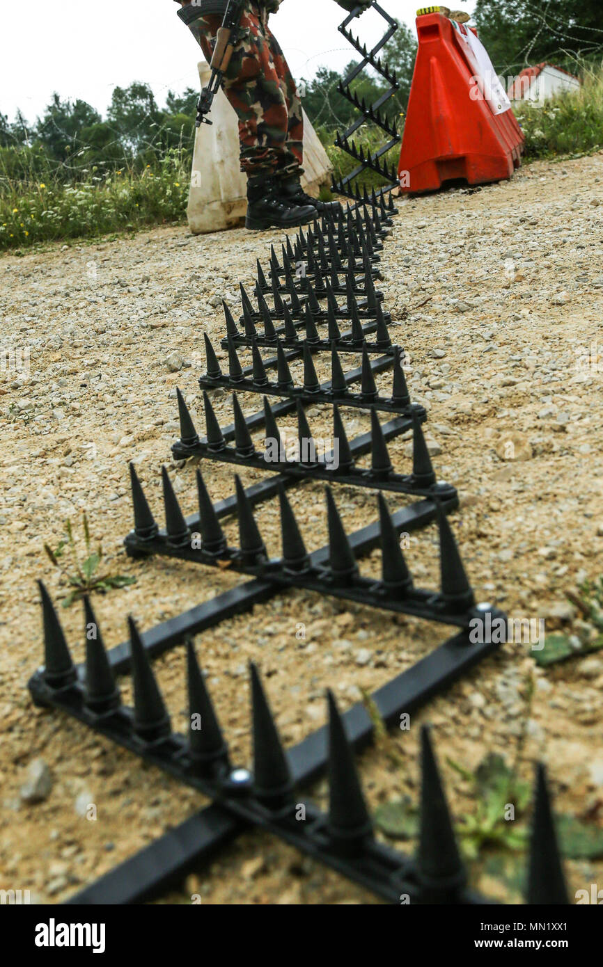 Spike strip hi-res stock photography and images - Alamy