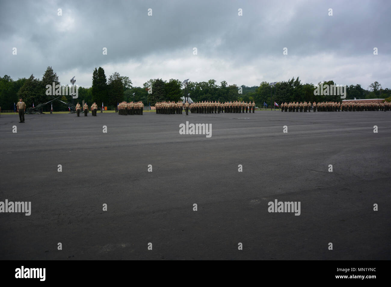 Military personnel and civilians attend Officer Candidate School class ...