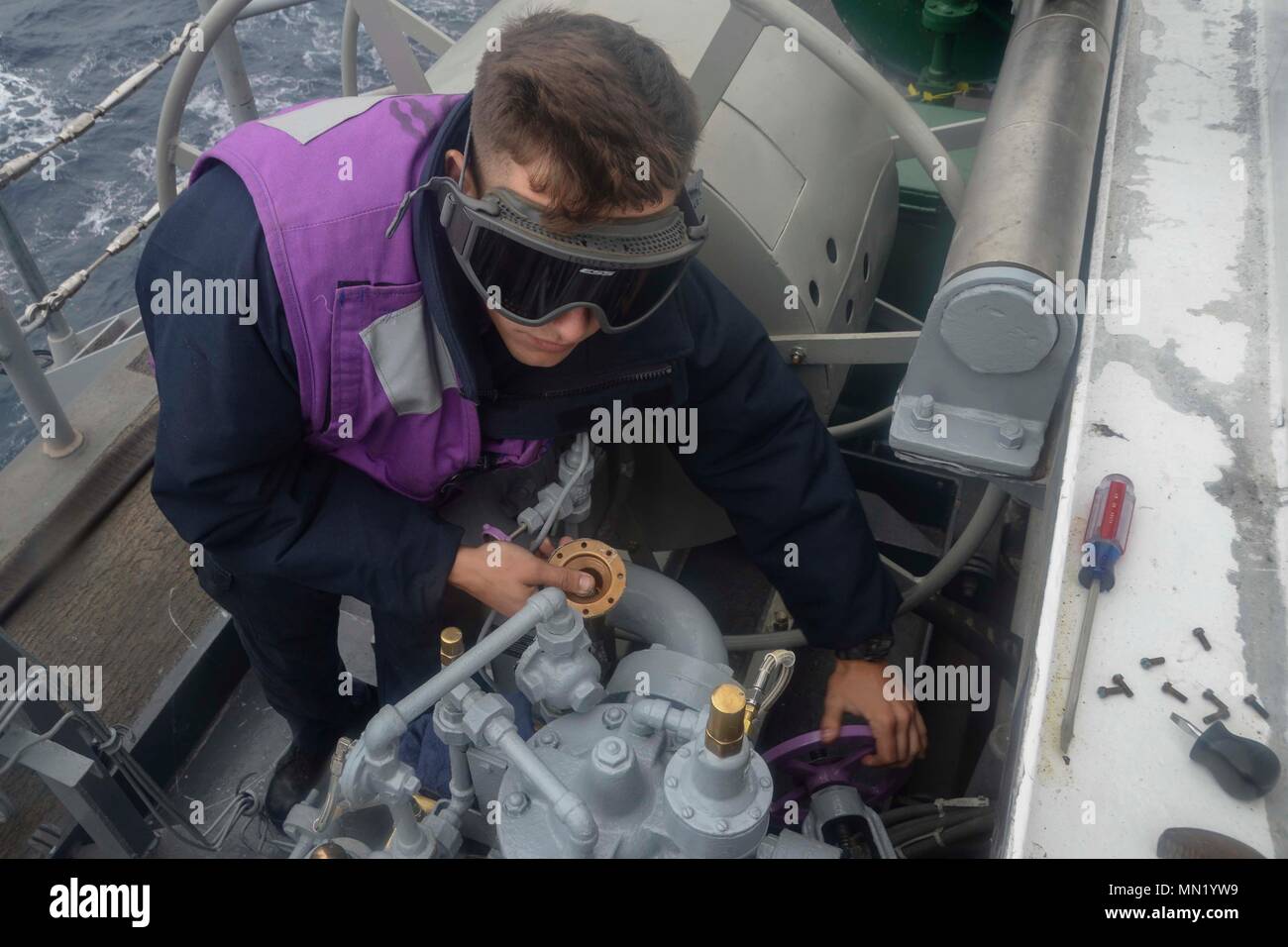 170811-N-NB142-377 PACIFIC OCEAN (Aug. 11, 2017) Airman Jack Iguess ...