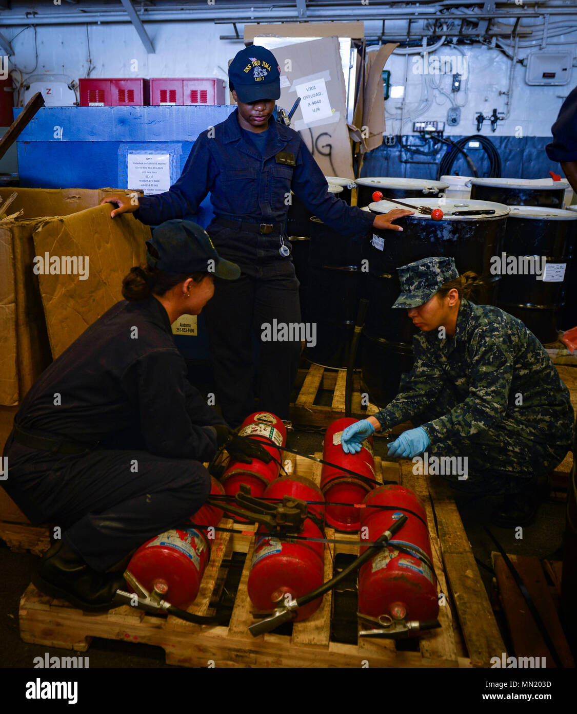 MAYPORT, Fla. (August 10, 2017) Sailors secure halon cylinders to a ...