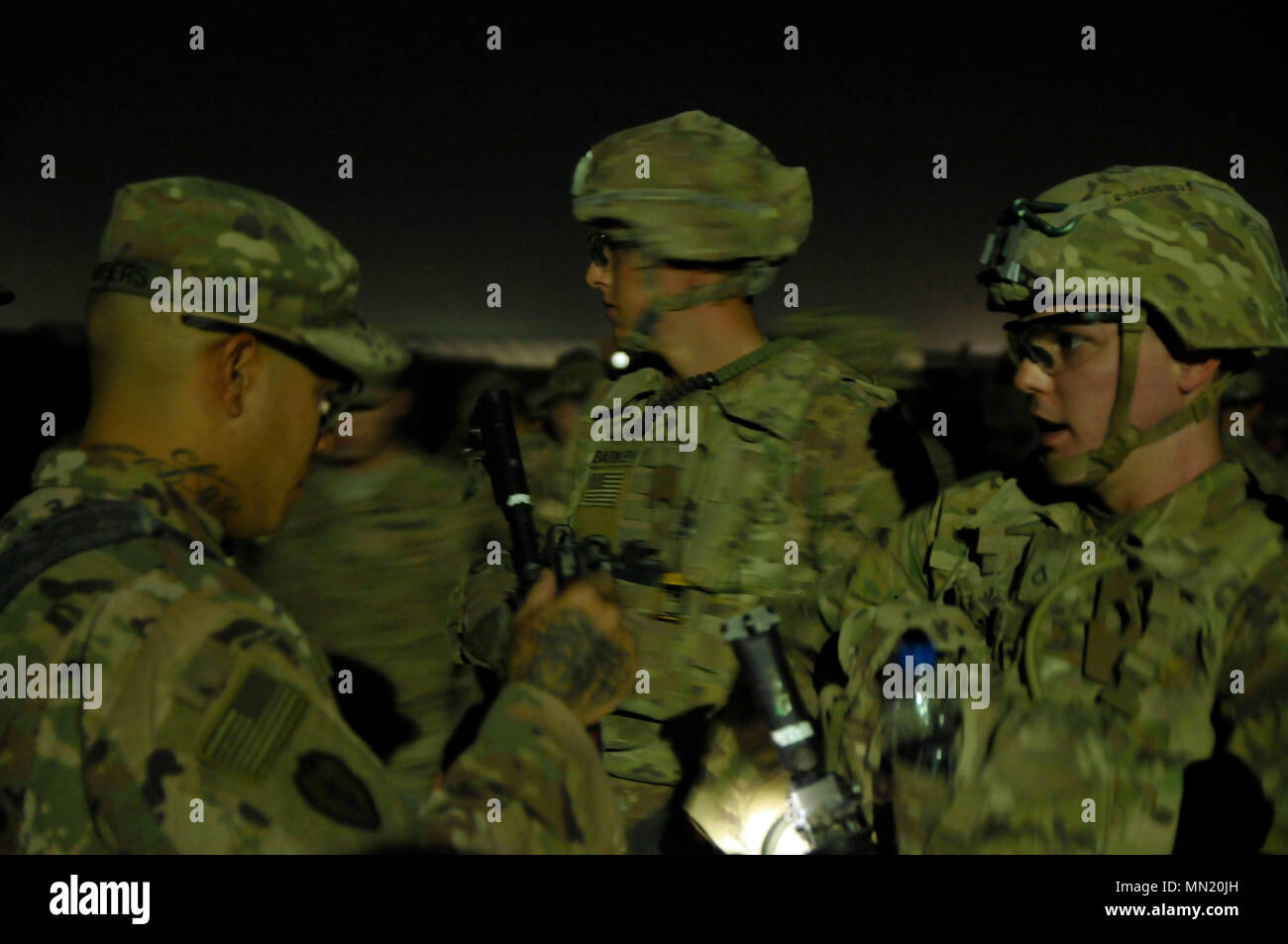 Sgt. 1st Class Jeremy Chambers (center), a platoon sergeant in Alpha ...