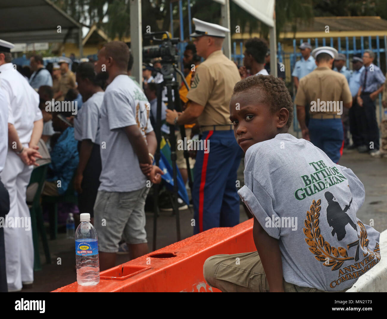 A young child looks at the camera during the Solomon Scouts and ...