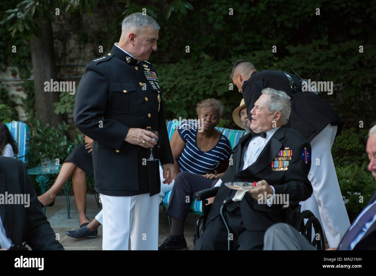 World War II veteran Col. Archie “Hap” speaks with the Assistant ...