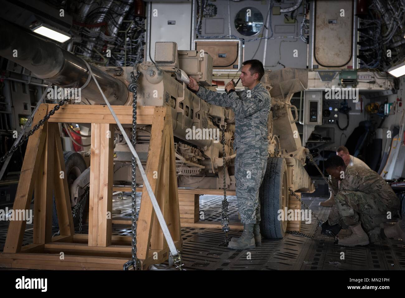 Senior Airman David Tiradeau, a ramp coordinator assigned to the 386th ...