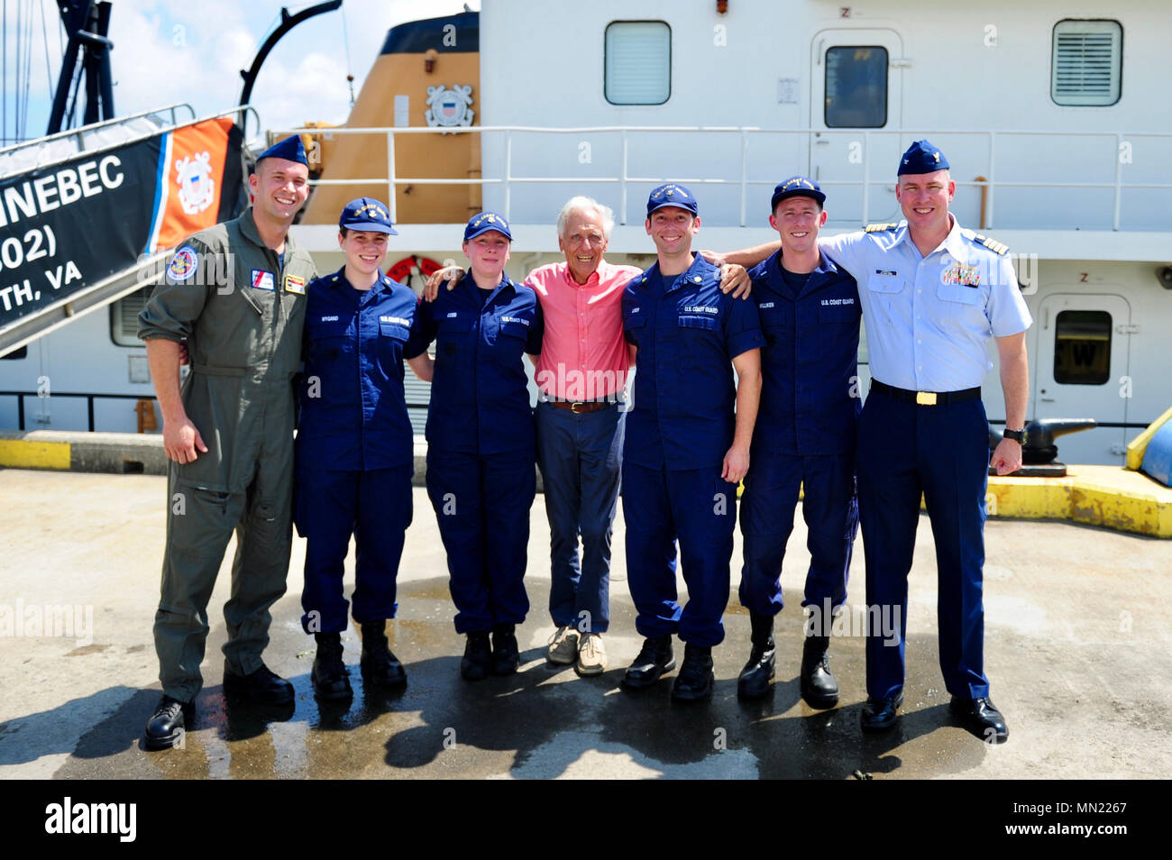 From left to right: Coast Guard Petty Officer 3rd Class John Fuller ...