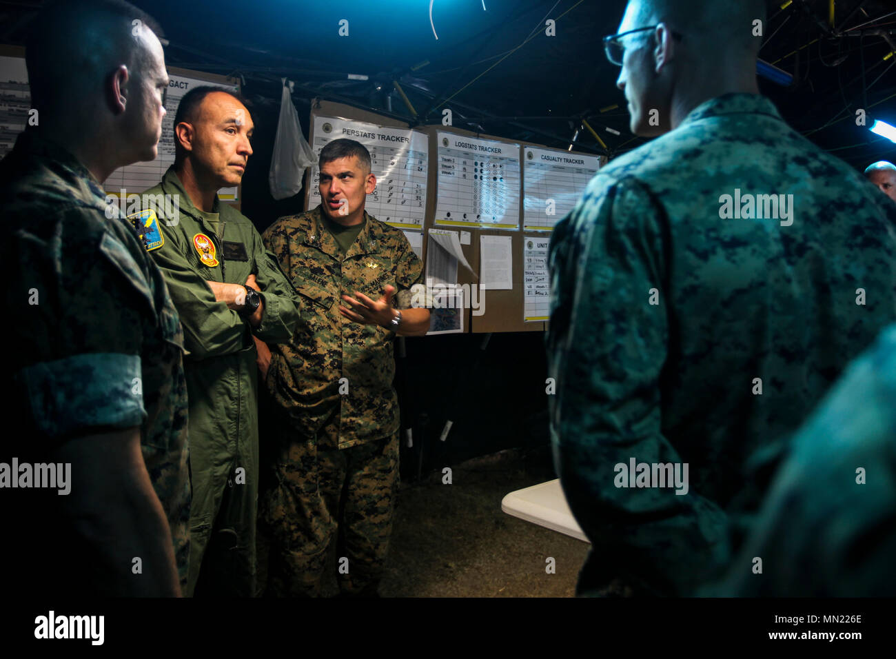 Colonel Peter N. Lee, center, the assistant chief of staff of ...