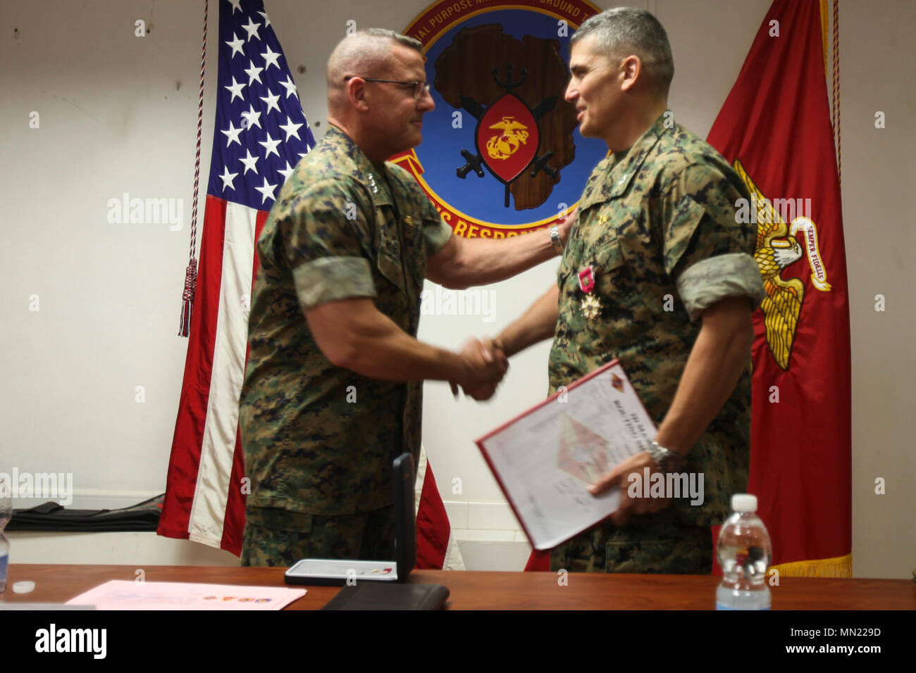 Lieutenant Gen. Robert F. Hedelund, left, the II Marine Expeditionary ...