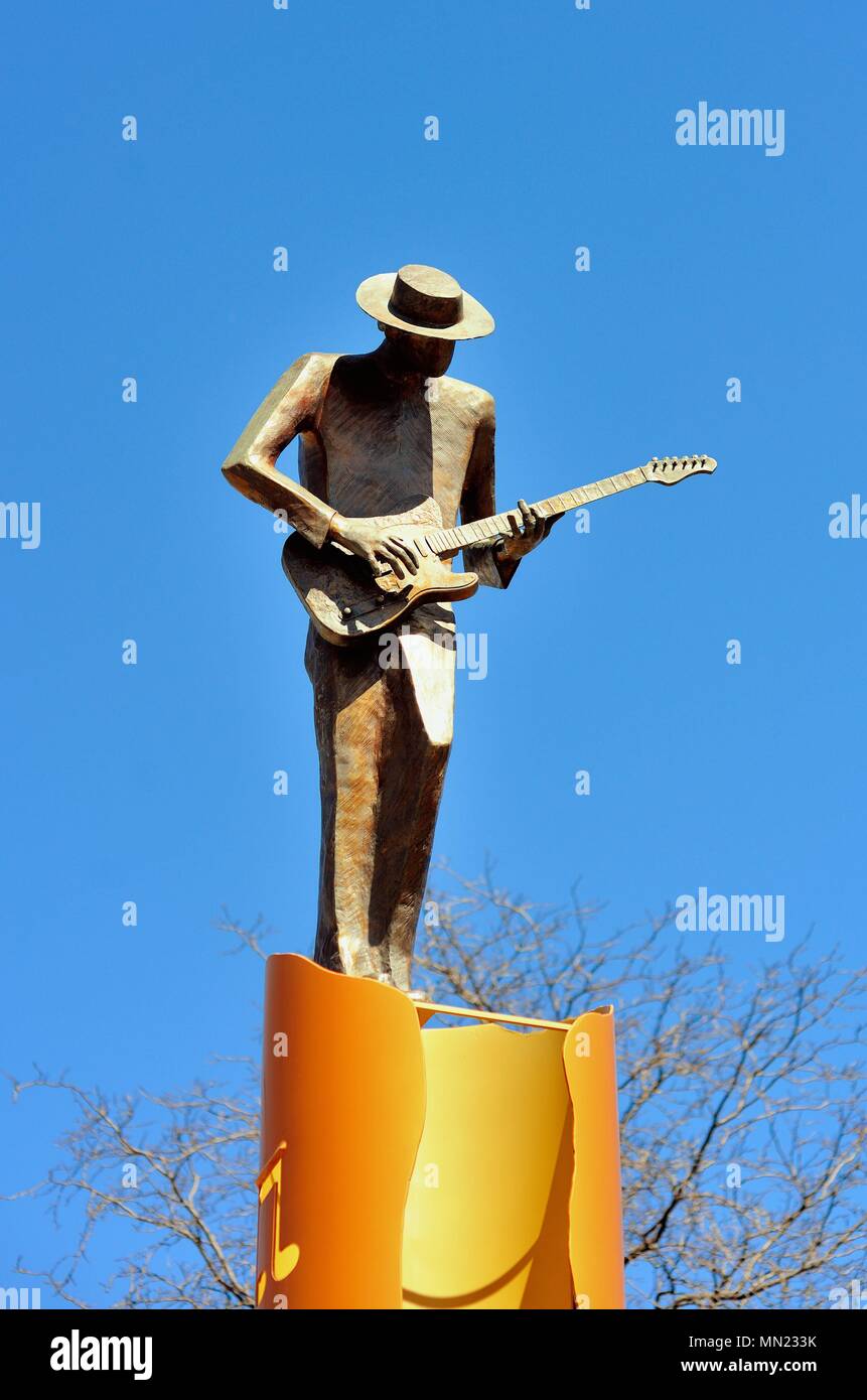 Chicago, Illinois, USA. Guitar playing statue at the intersection of ...