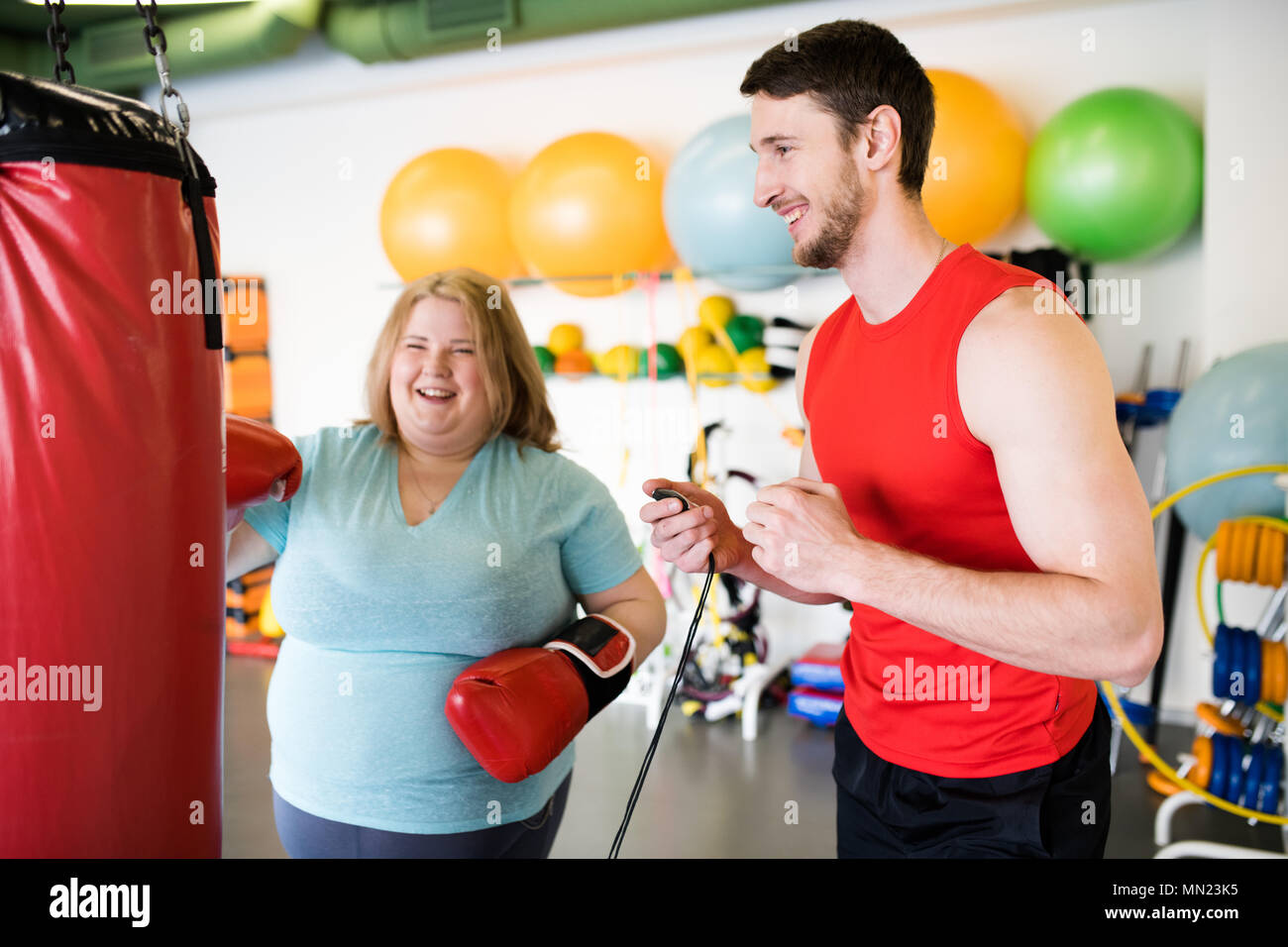 Overweight woman man laughing hi-res stock photography and images - Alamy