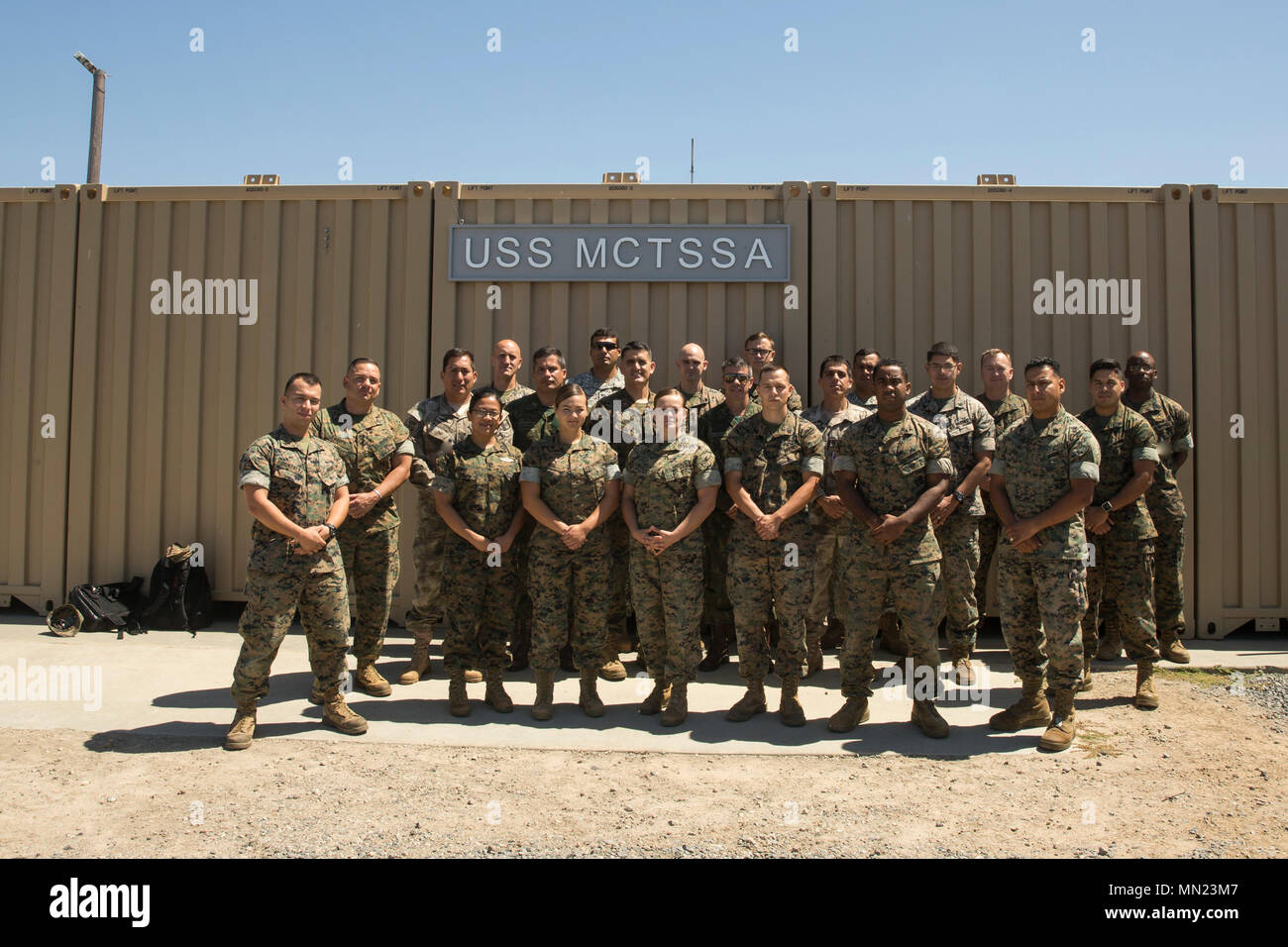 U.S. Marines and foreign military leaders pose for a group photo at the ...