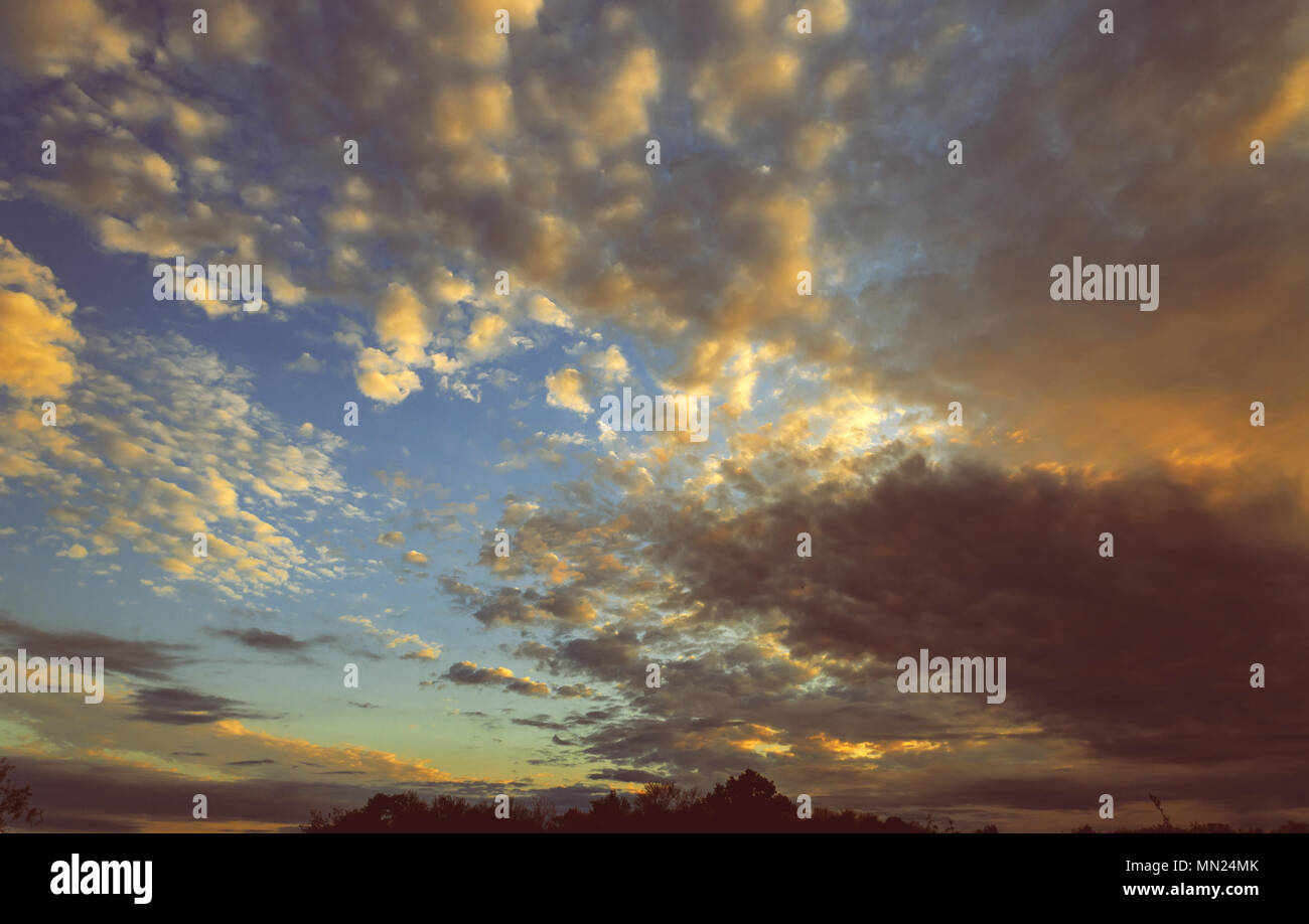 Colorful clouds down setting hi-res stock photography and images - Alamy