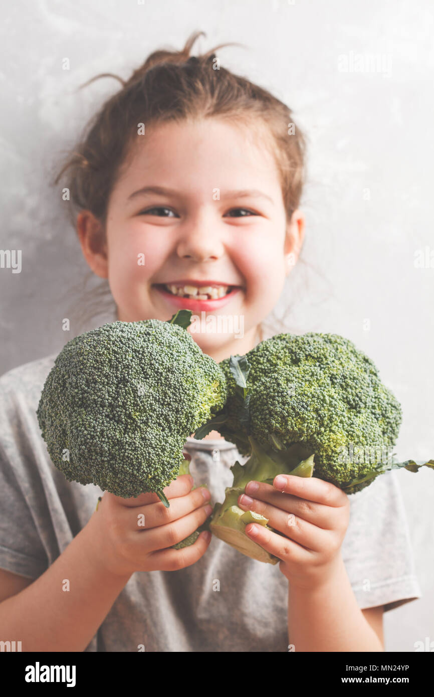 Child eating lettuce salad hi-res stock photography and images - Alamy
