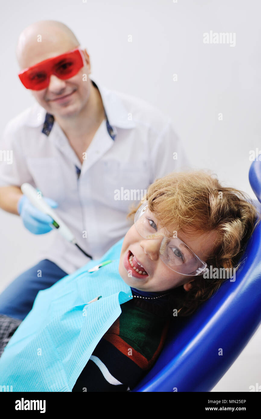 a young patient is afraid to treat teeth Stock Photo - Alamy