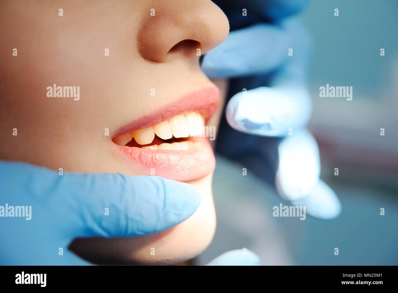 teeth of a beautiful girl closeup Stock Photo - Alamy