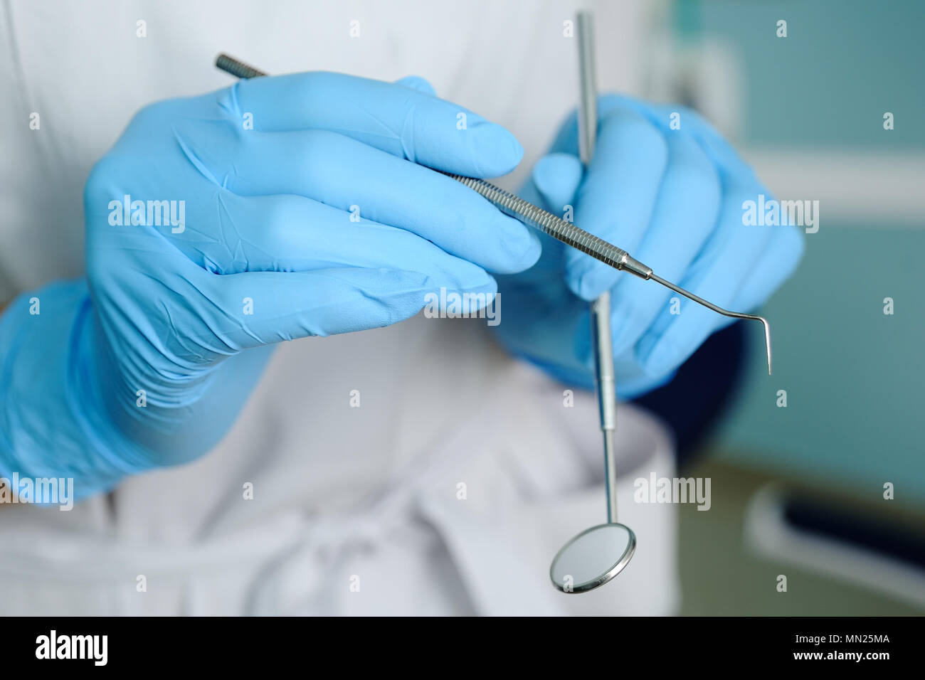 dentist hand with dental tools Stock Photo - Alamy