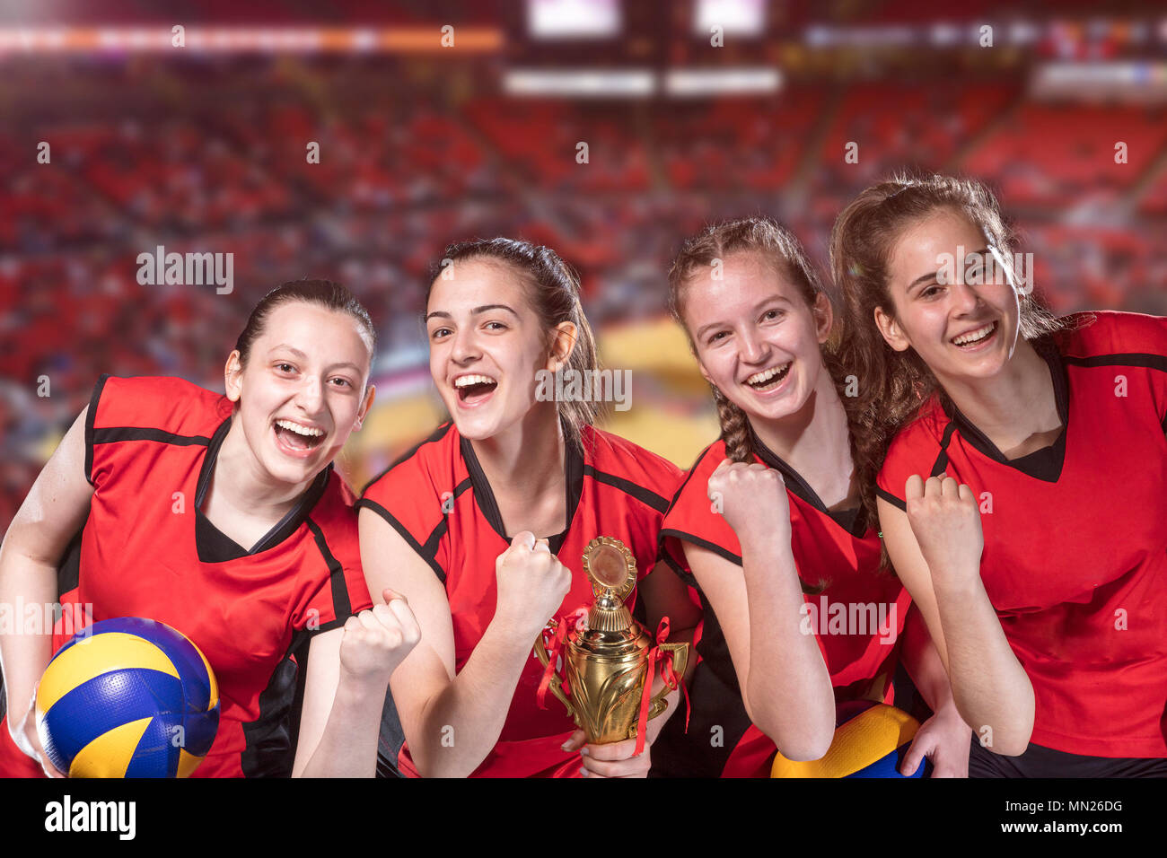 Woman volleyball Players celebrating victory and gold medal Stock Photo ...