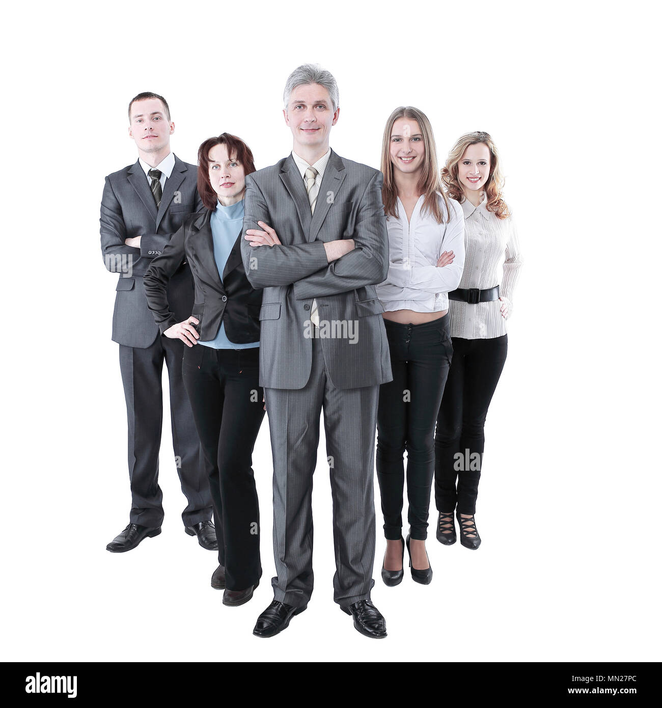 Team leader stands with coworkers in background Stock Photo - Alamy