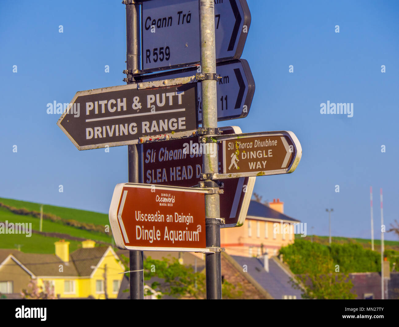 Direction signs in the streets of Dingle Stock Photo - Alamy