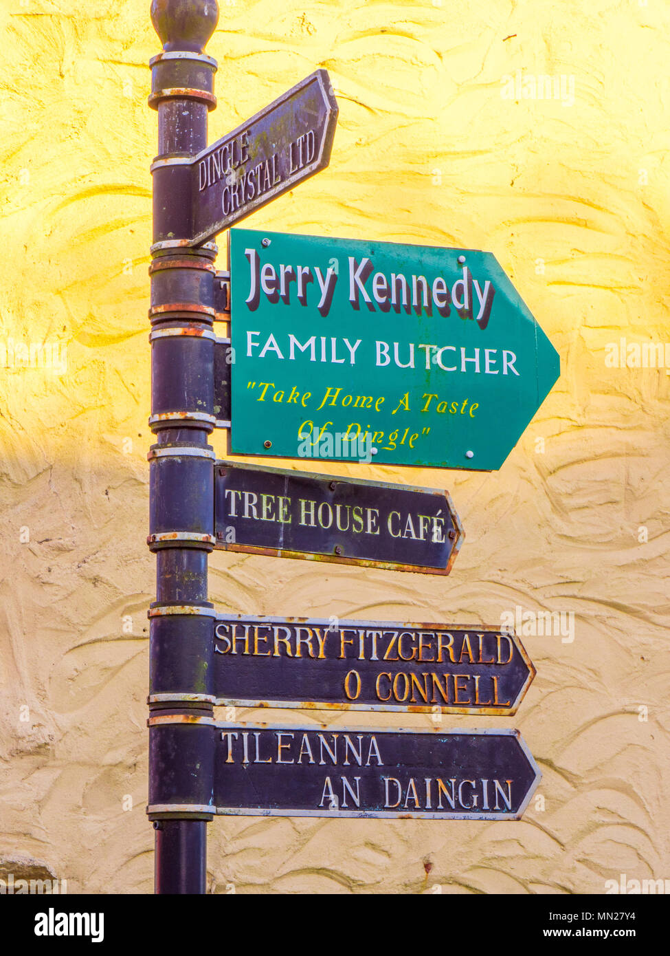 Direction signs in the streets of Dingle Stock Photo - Alamy