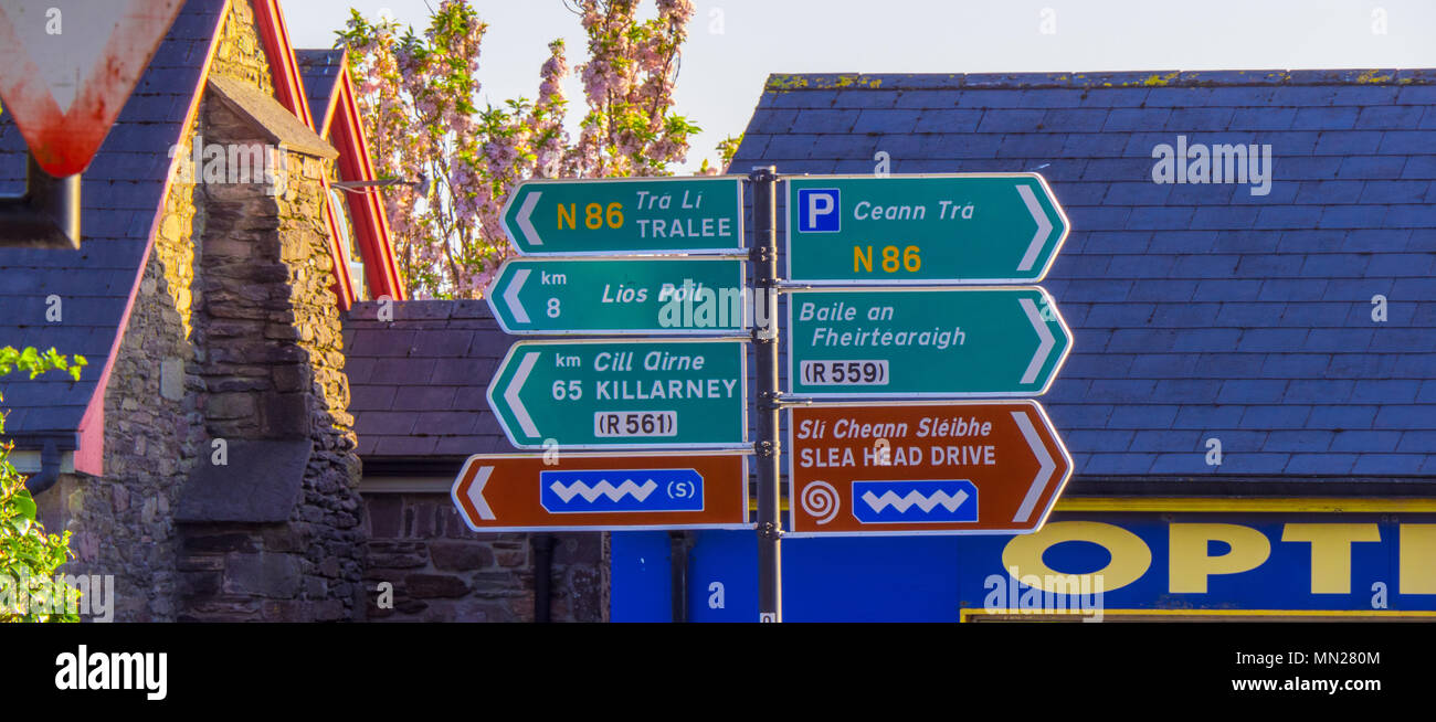 Direction signs in the streets of Dingle Stock Photo - Alamy