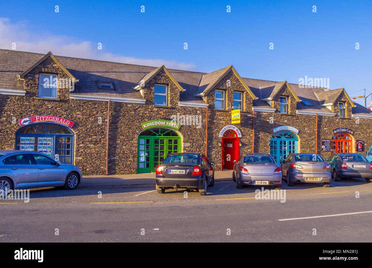 Amazing street view in Dingle - beautiful colored houses Stock Photo ...